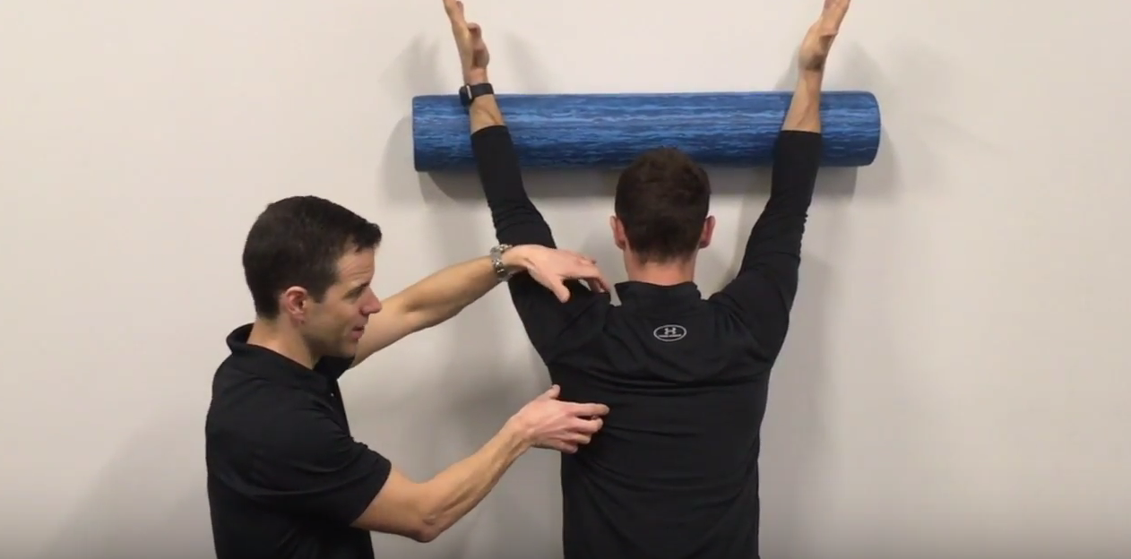 Wall Slide with Roller for Shoulder Mobility - Motus Physiotherapy